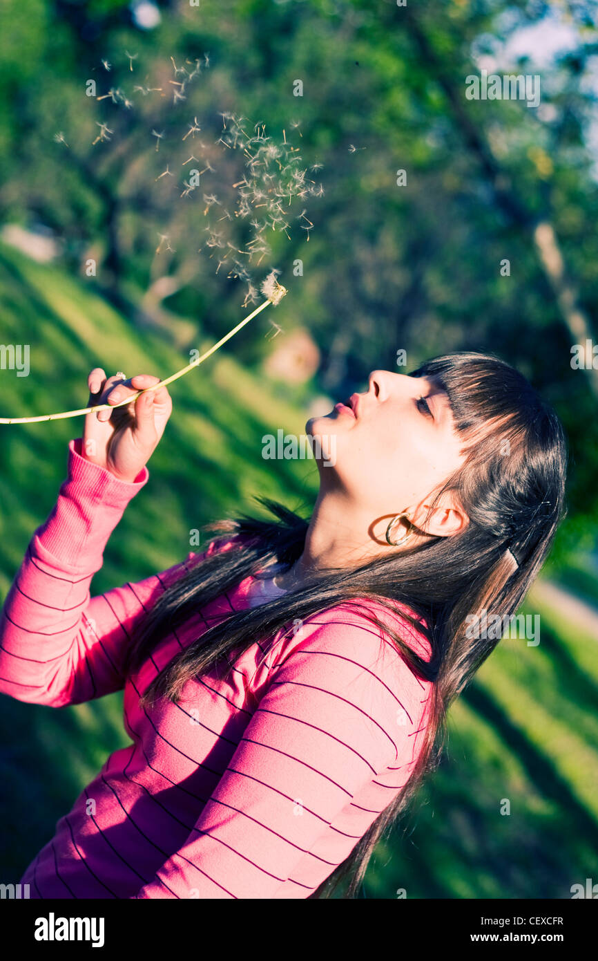 Girl proposing you to make a wish Stock Photo - Alamy