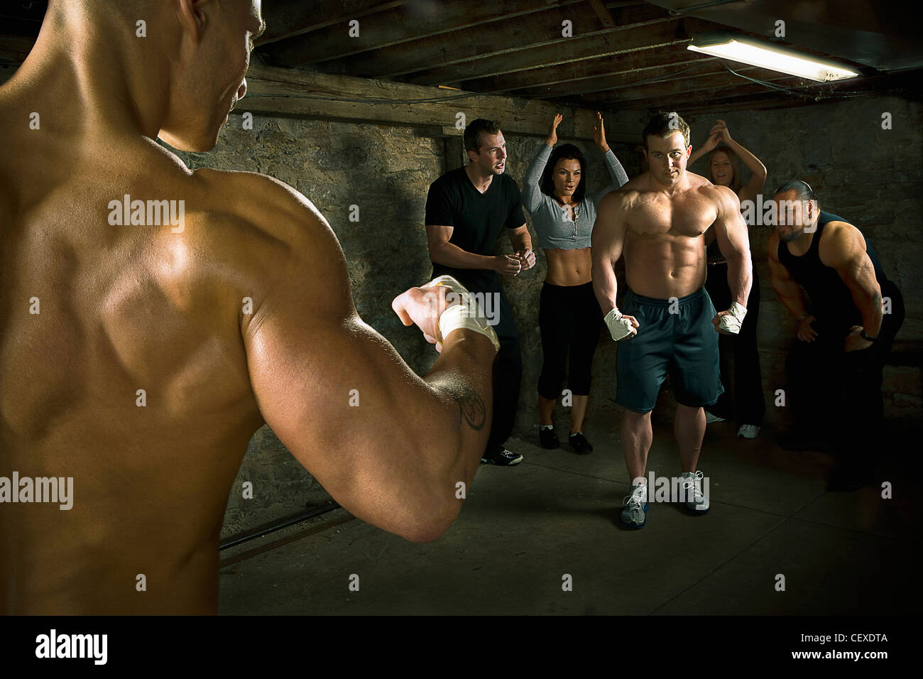 People watching two men boxing without gloves Stock Photo - Alamy