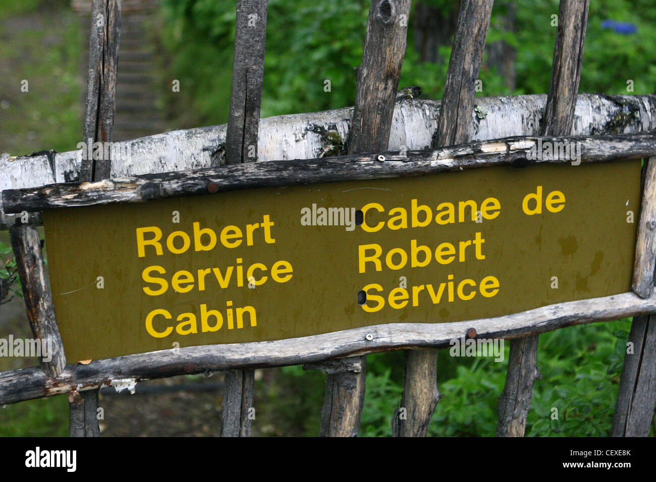 Historic Robert Service Cabin nestled in the forest in Dawson City ...