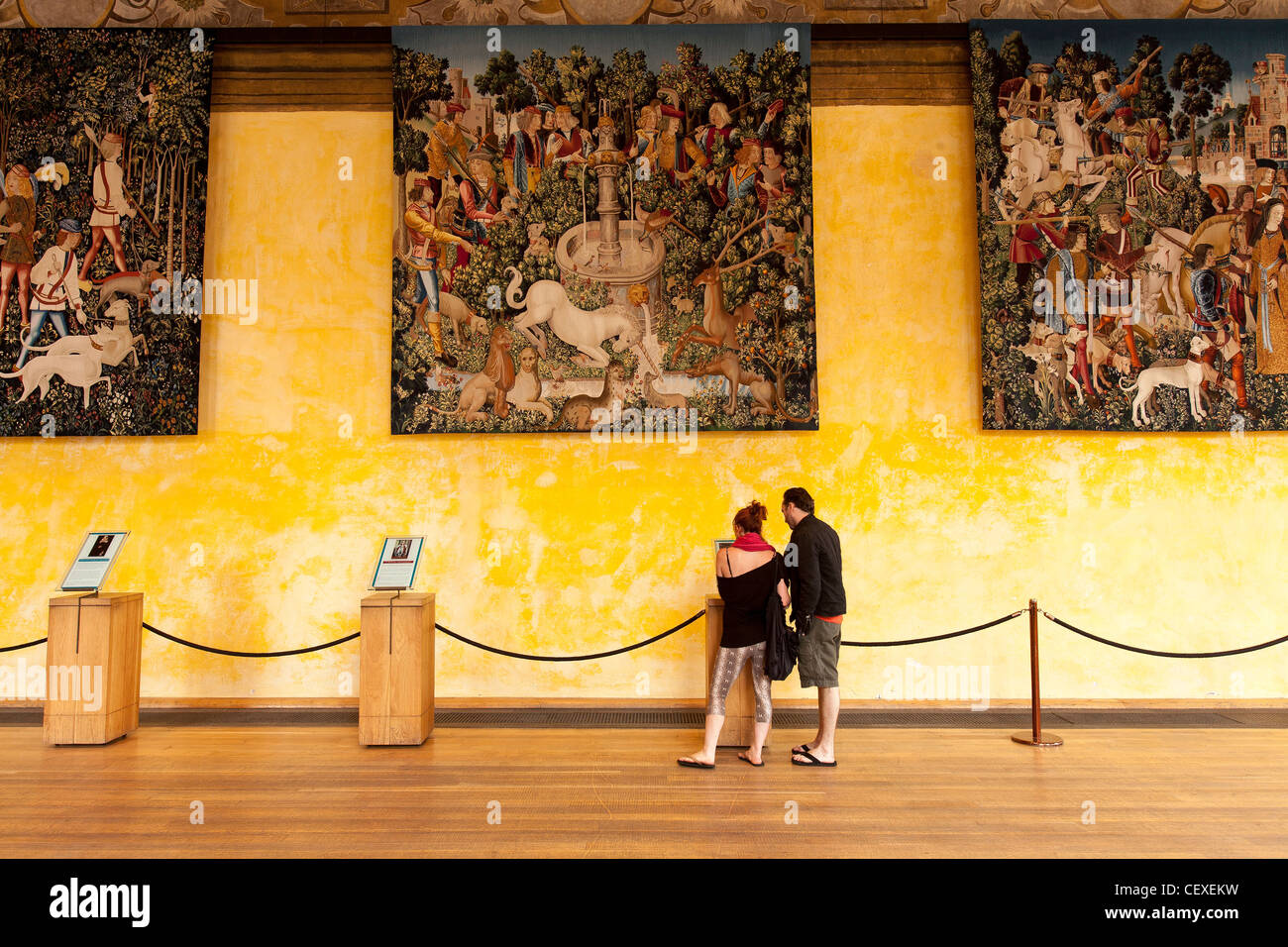 Visitors and tourists looking at the replica Unicorn tapestry in the ...