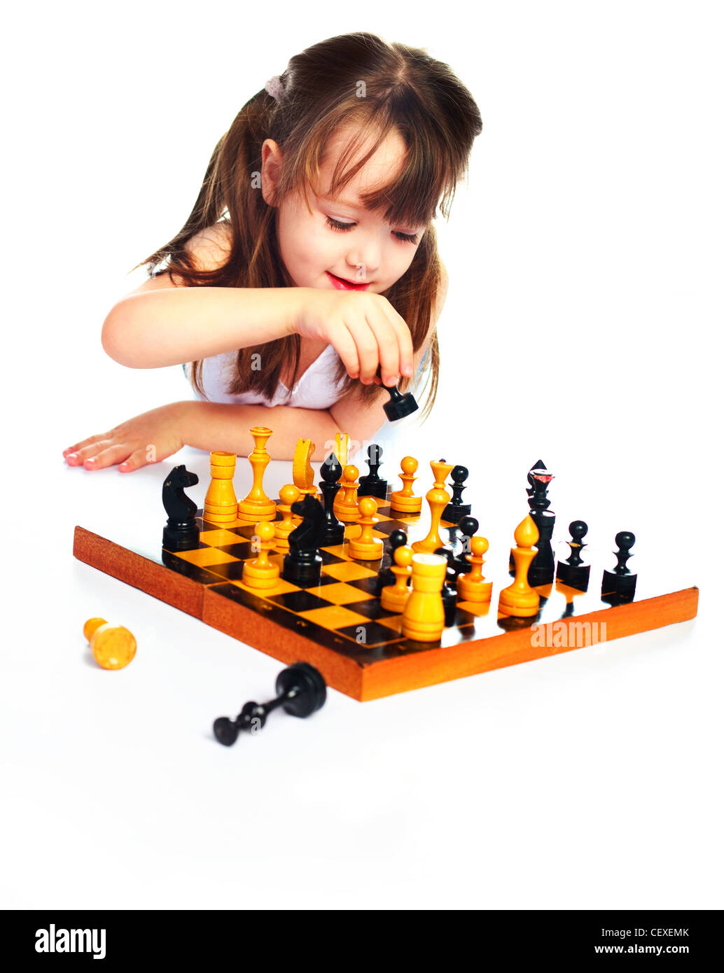 little girl playing chess, isolated against white background Stock ...