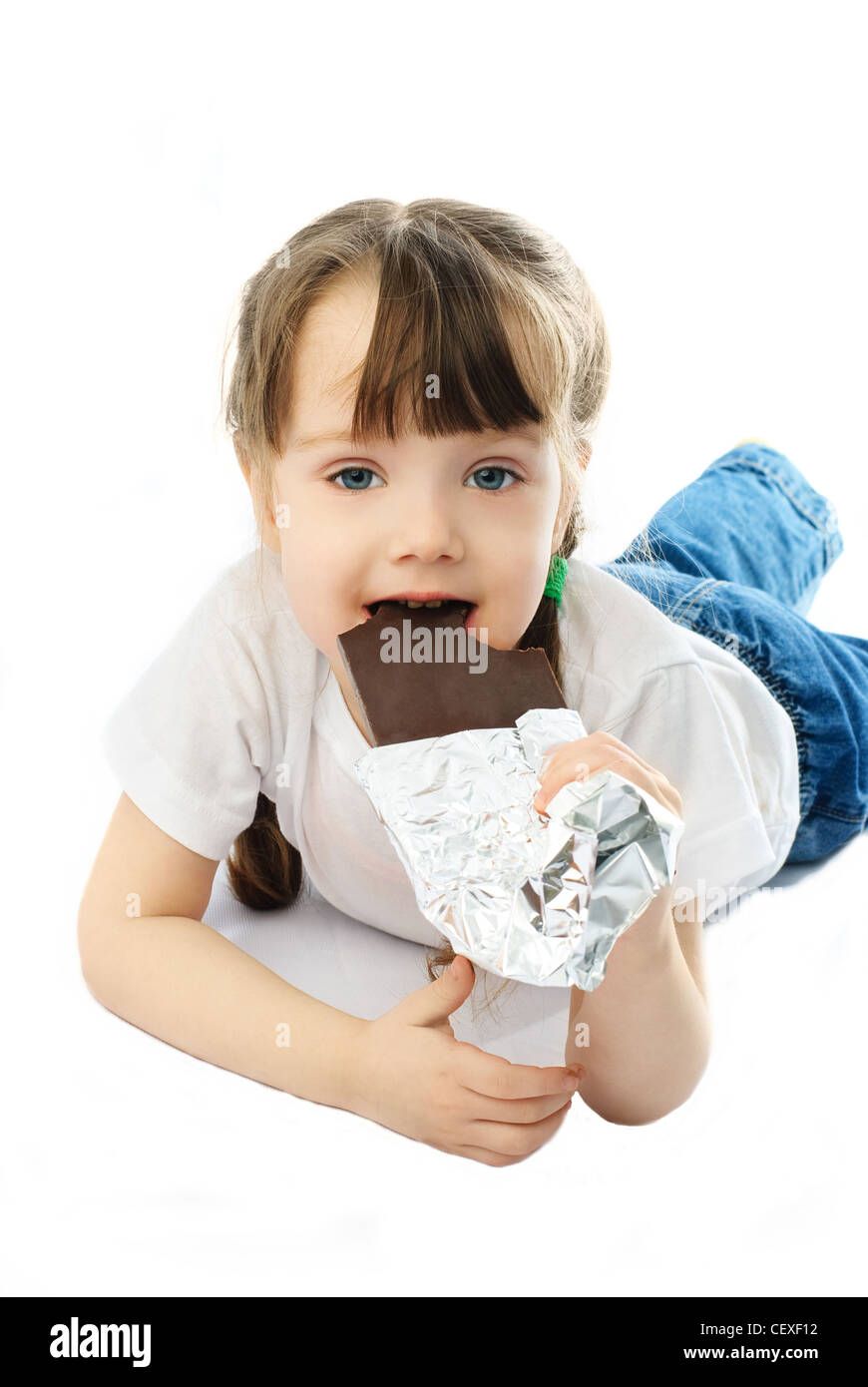 happy girl eating chocolate, isolated Stock Photo - Alamy