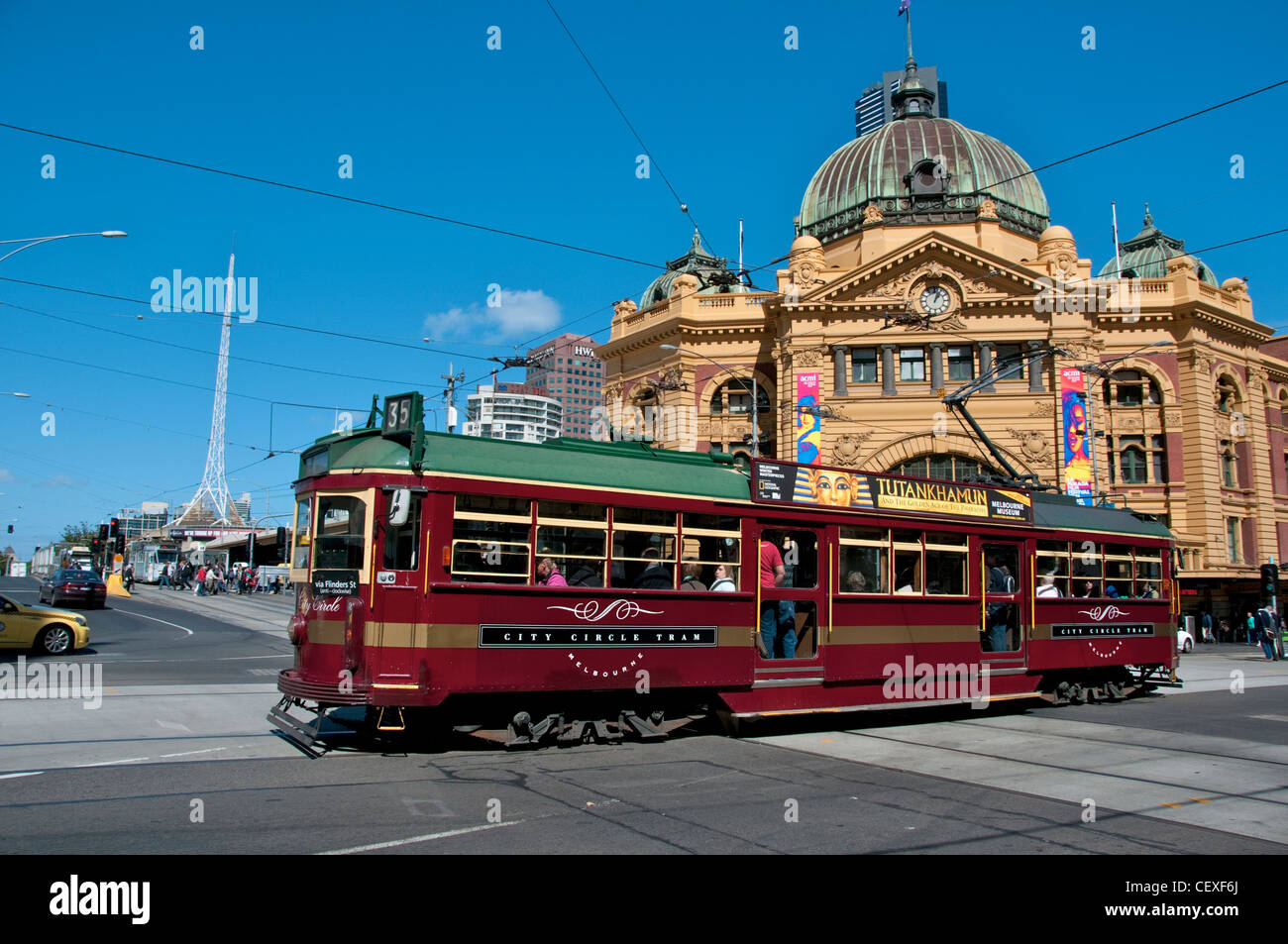 The City Circle tram passing Flinders Street Station Melbourne ...