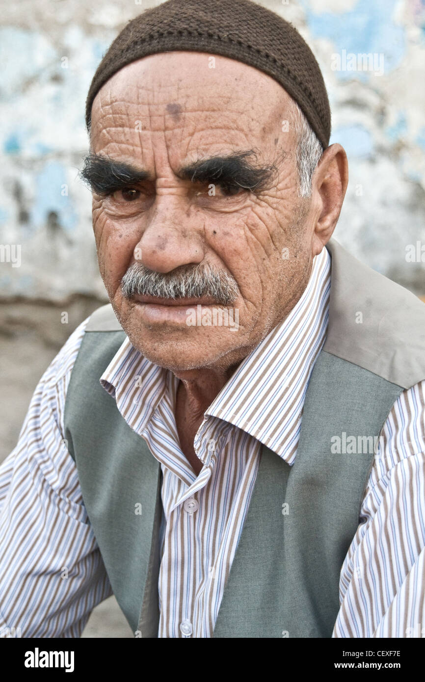 Portrait of a Muslim Kurdish man wearing a religious skullcap in the ...