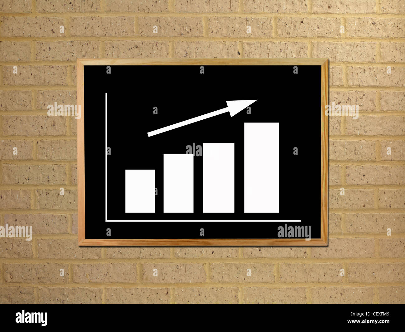 A black board mounted on a brick wall Stock Photo - Alamy