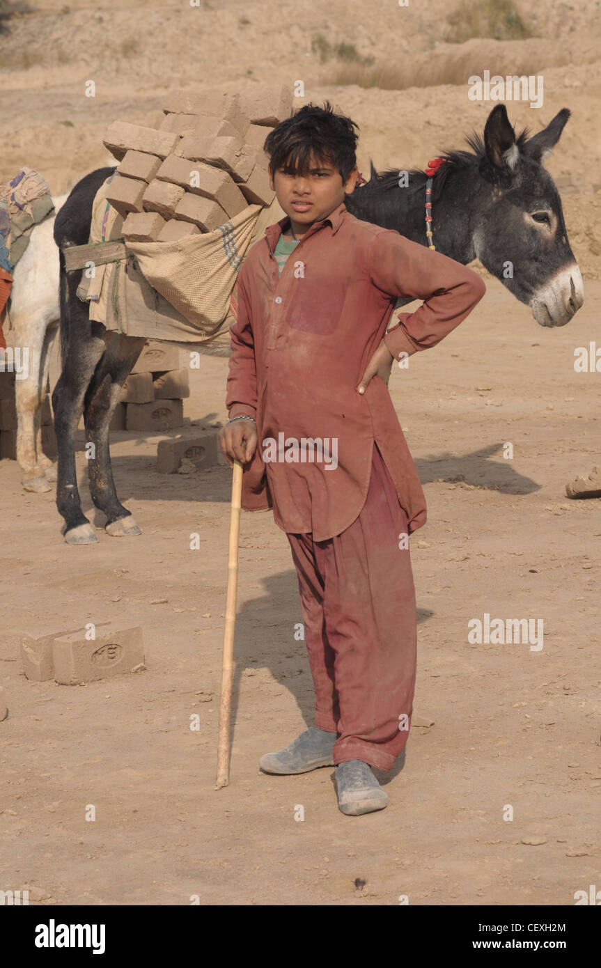 Child with donkey hi-res stock photography and images - Alamy