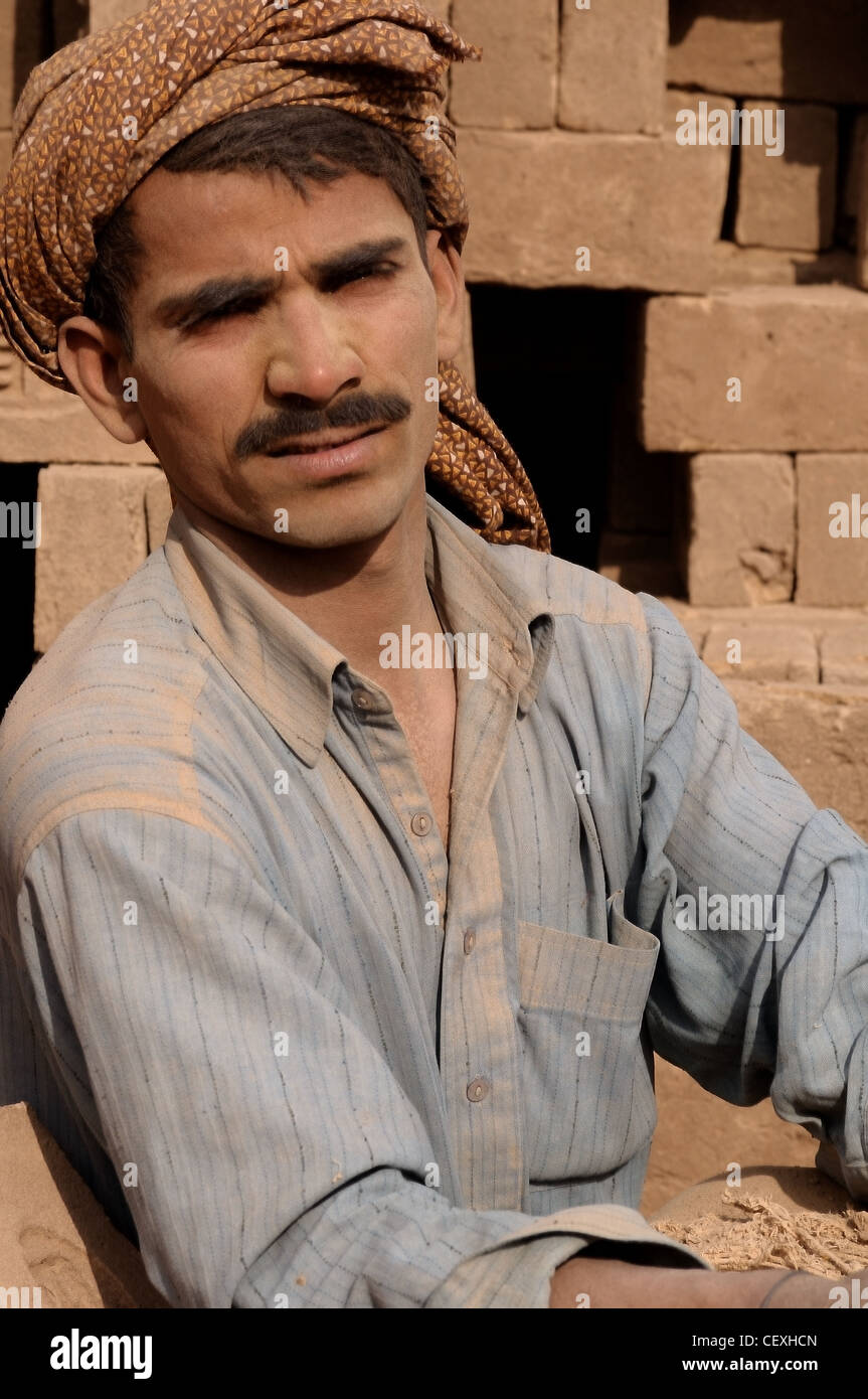 A turbaned man working at a brick kiln near Islamabad Stock Photo - Alamy