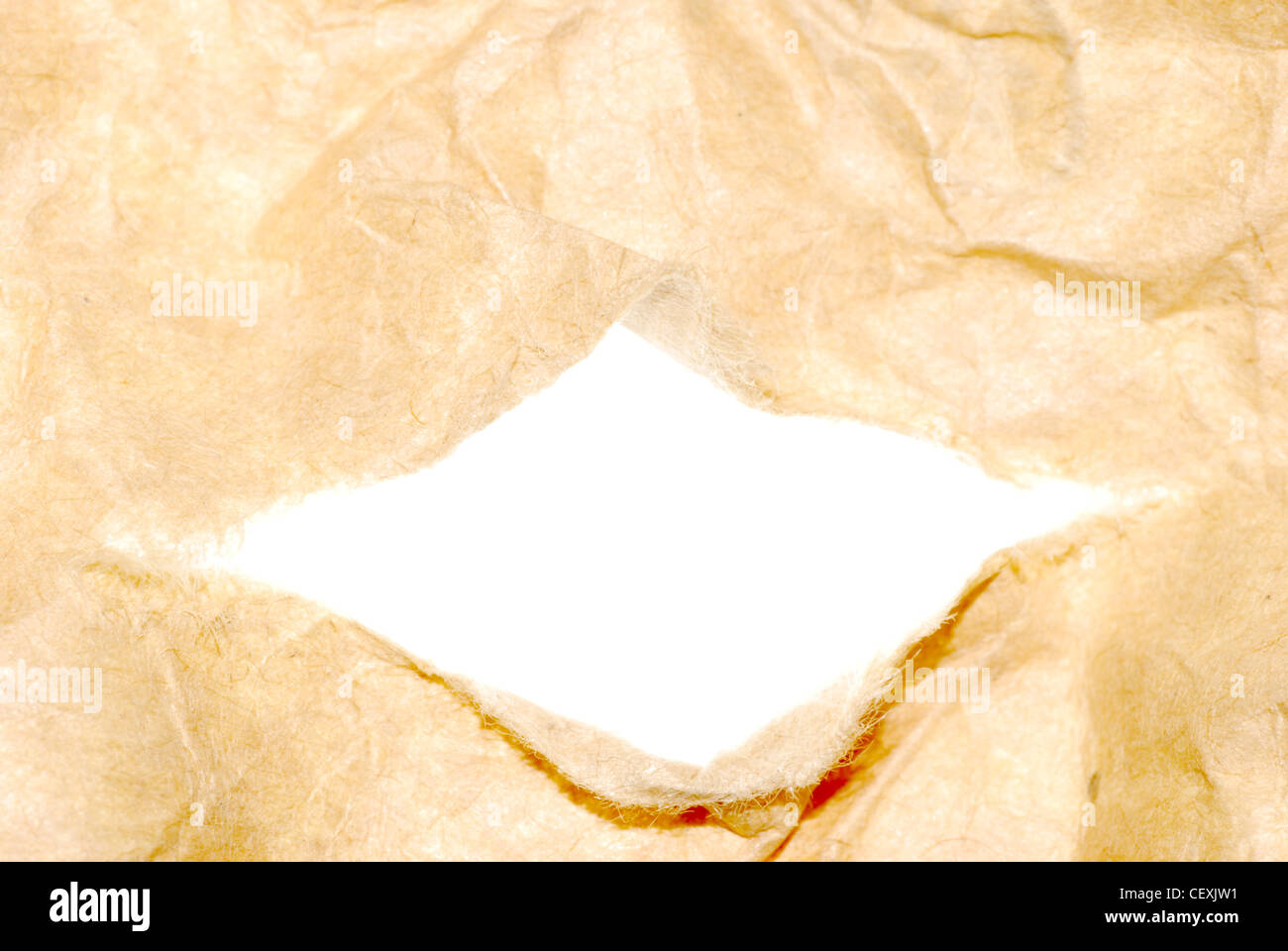Torn paper hole hi-res stock photography and images - Alamy