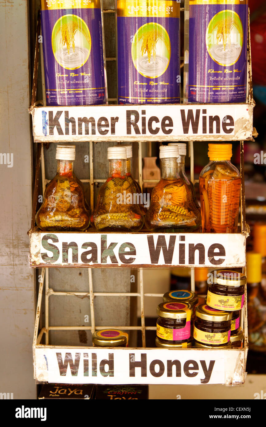 Khmer rice wine, wild honey and bottles of snake wine on sale on a ...