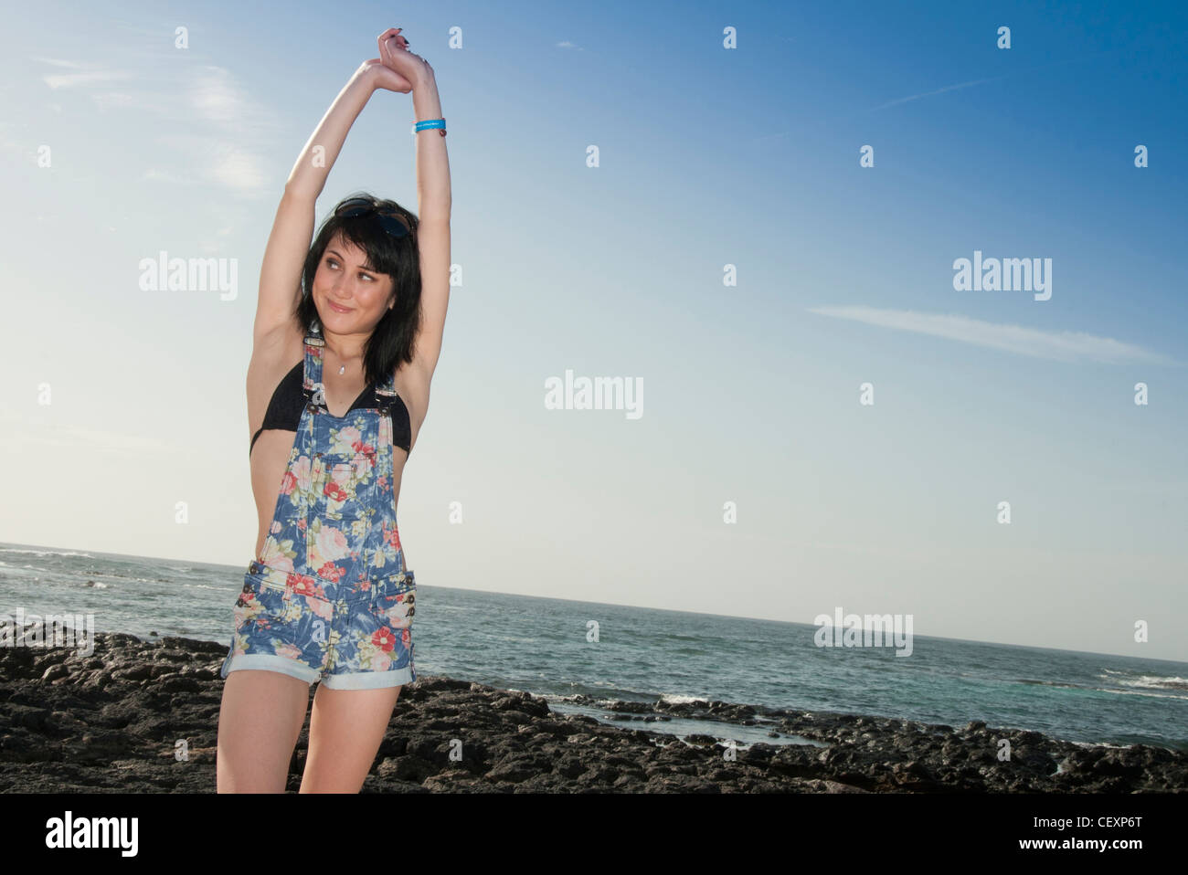 Woman yoga arms above head High Resolution Stock Photography and Images ...