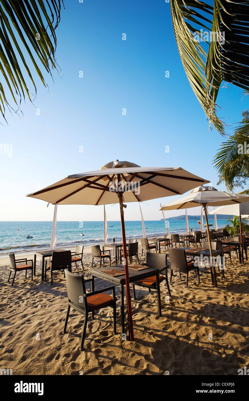 Seaside cafe at the tropical beach resort. Vertical shot Stock Photo ...