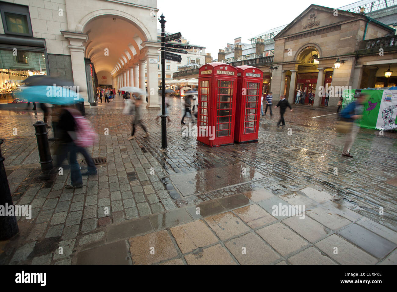 Shoppers outside in the rain hi-res stock photography and images - Alamy