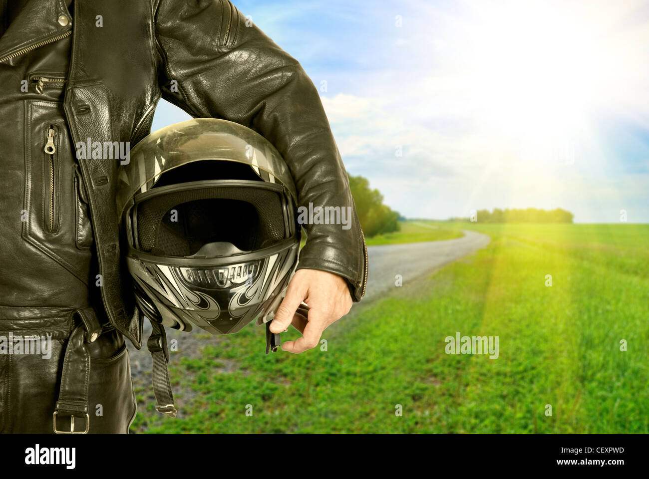 motorcycle biker with helmet closeup on a road Stock Photo - Alamy