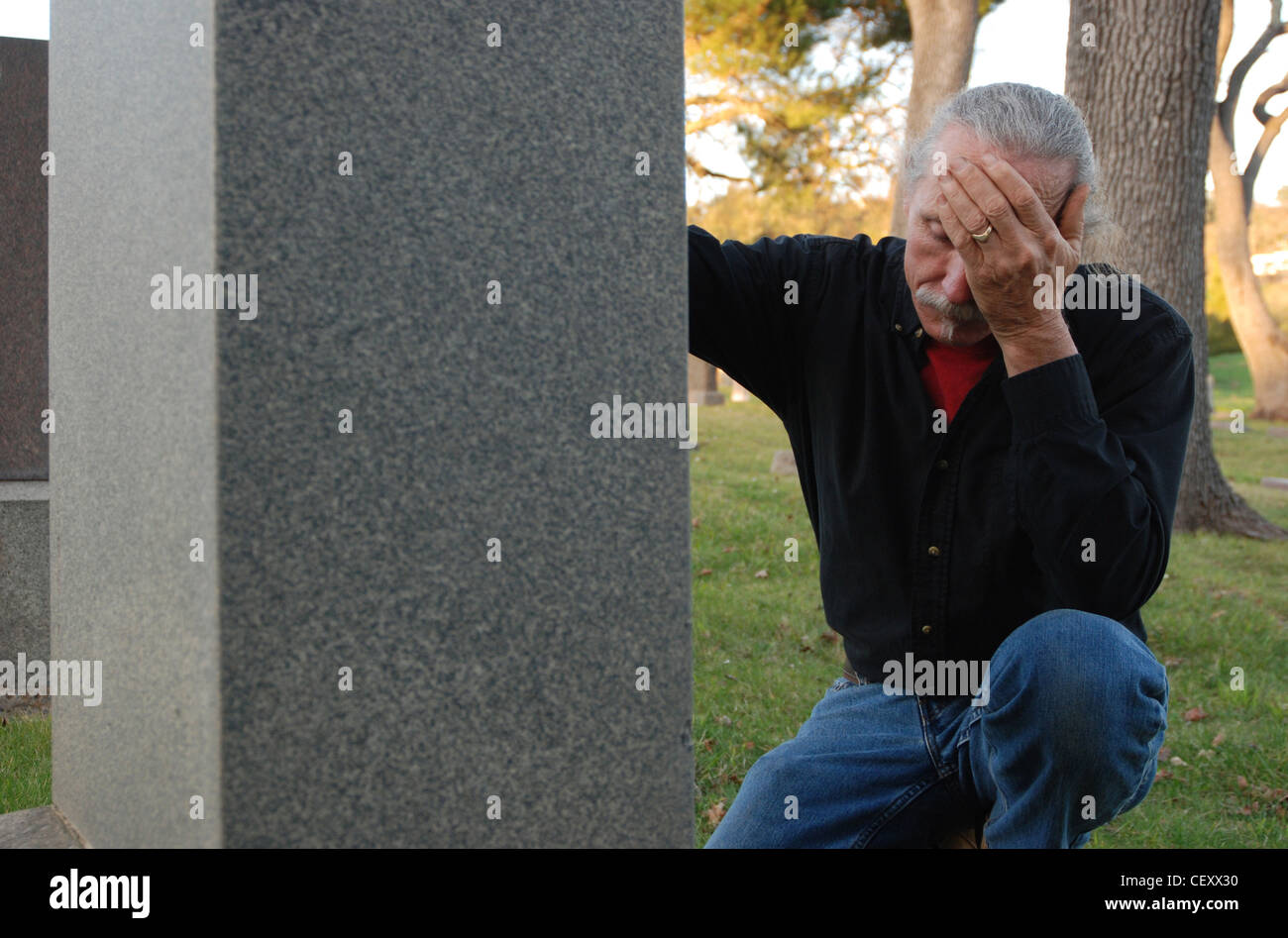 Bereavement head and hands hi-res stock photography and images - Alamy