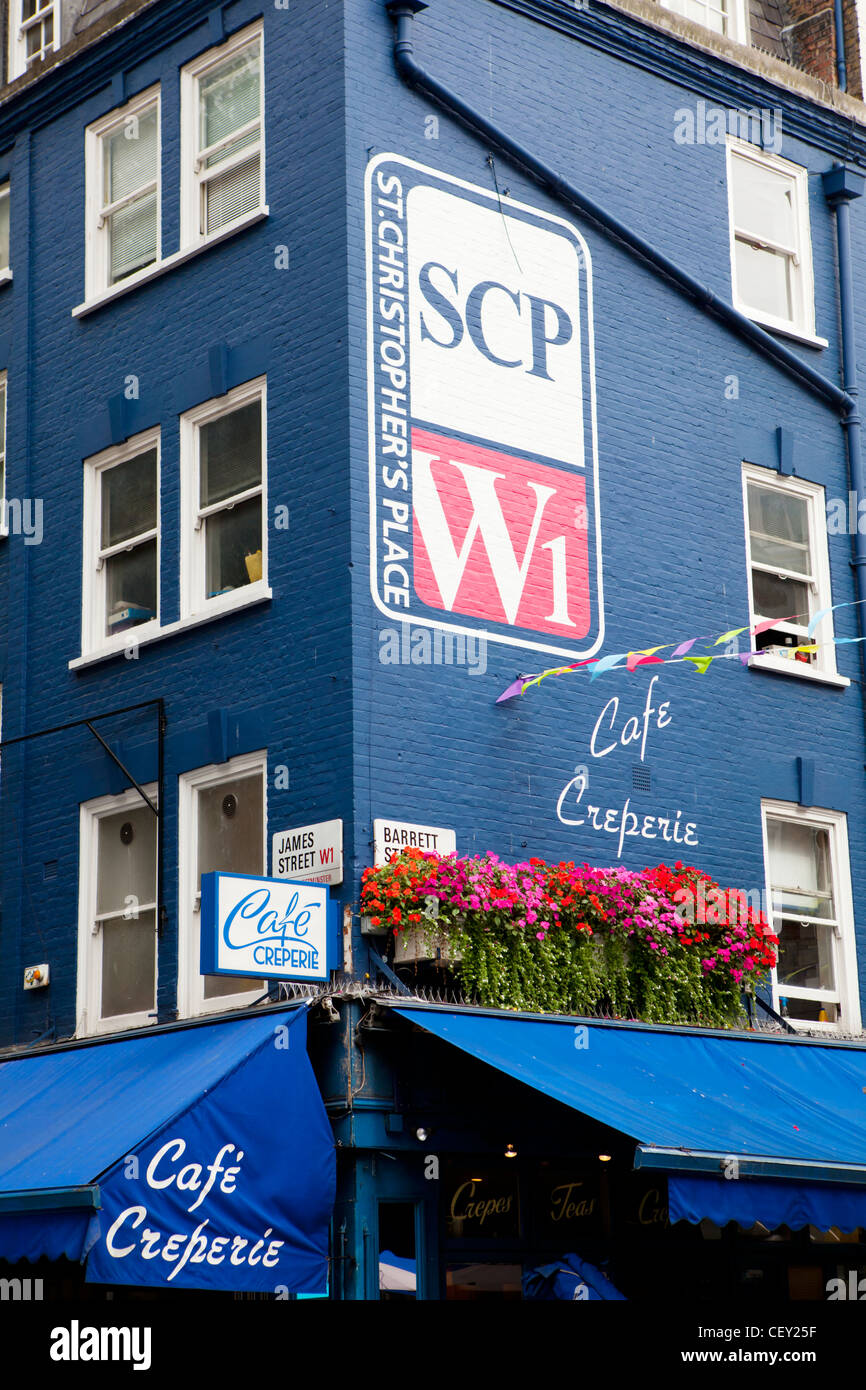 A blue painted cafe in the City of London Stock Photo - Alamy
