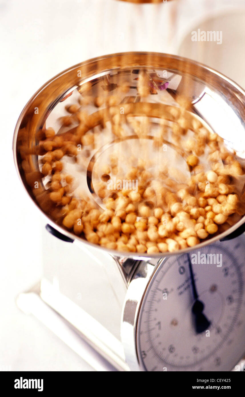 CX187431 A food scale with chickpeas being poured into it Stock Photo ...