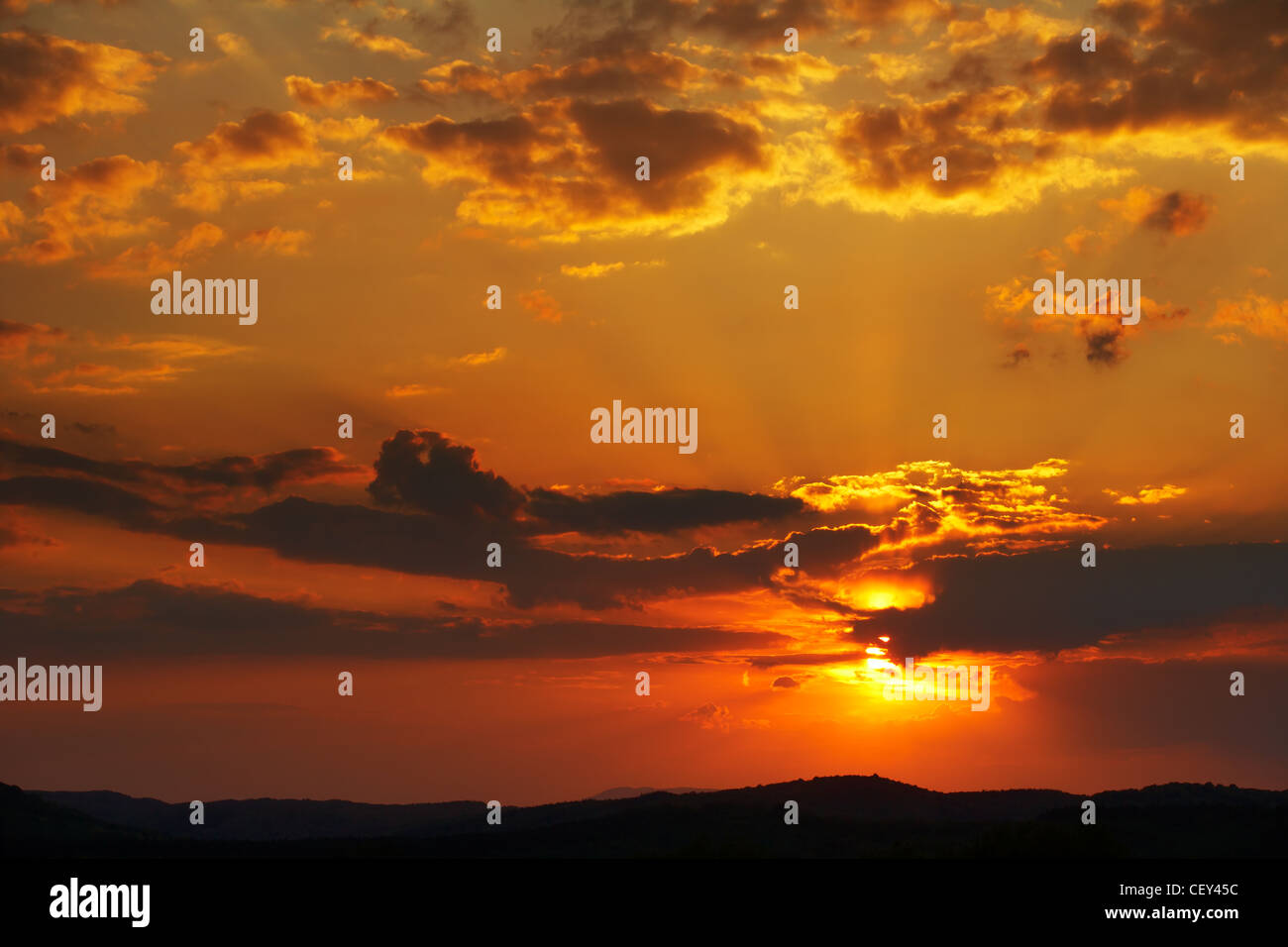 Red cloudy beauty sunset Stock Photo - Alamy