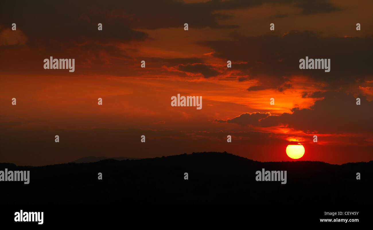 Red cloudy sunset landscape Stock Photo - Alamy