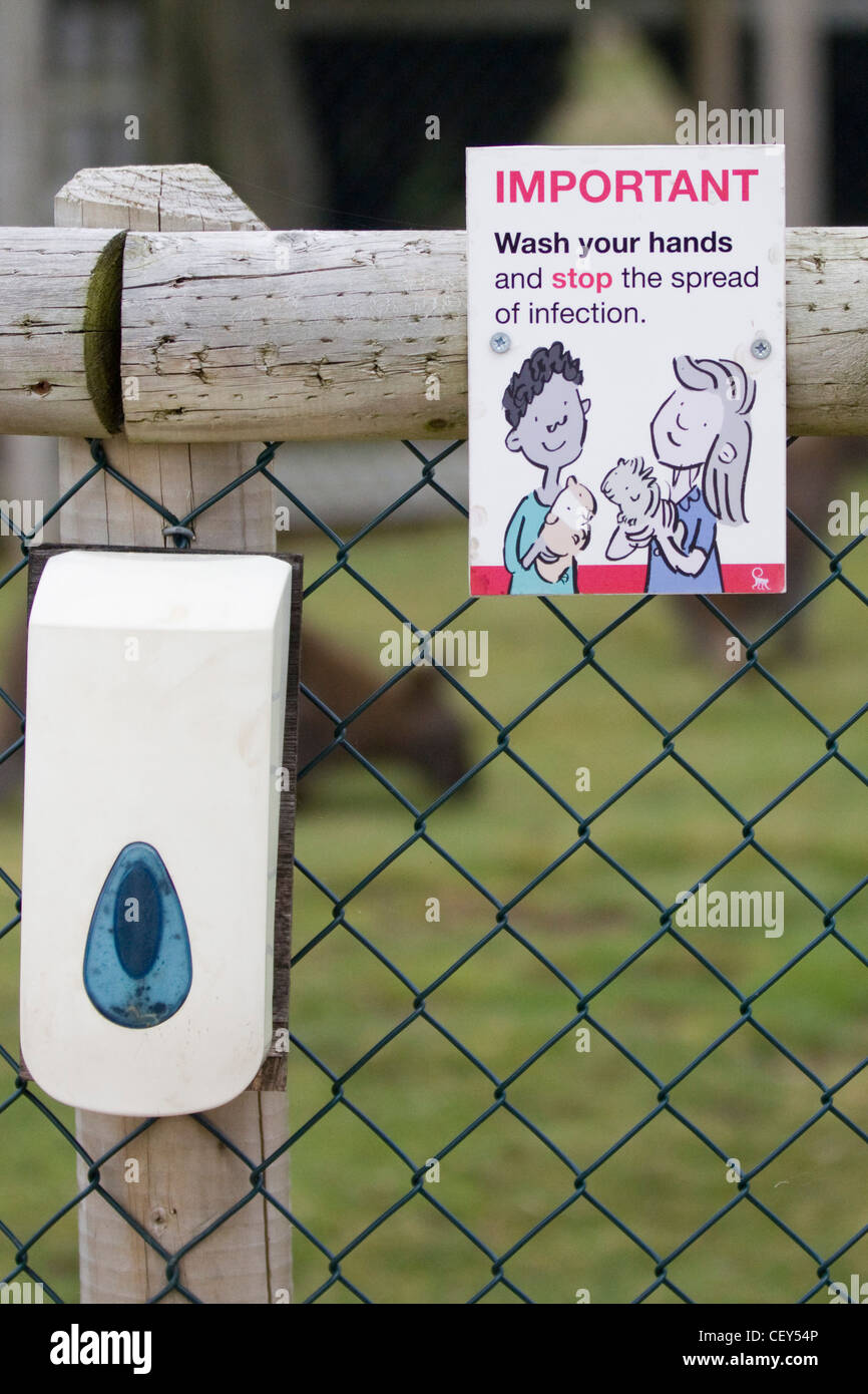 A Sign warning the public to wash hands to stop the spread of infection ...