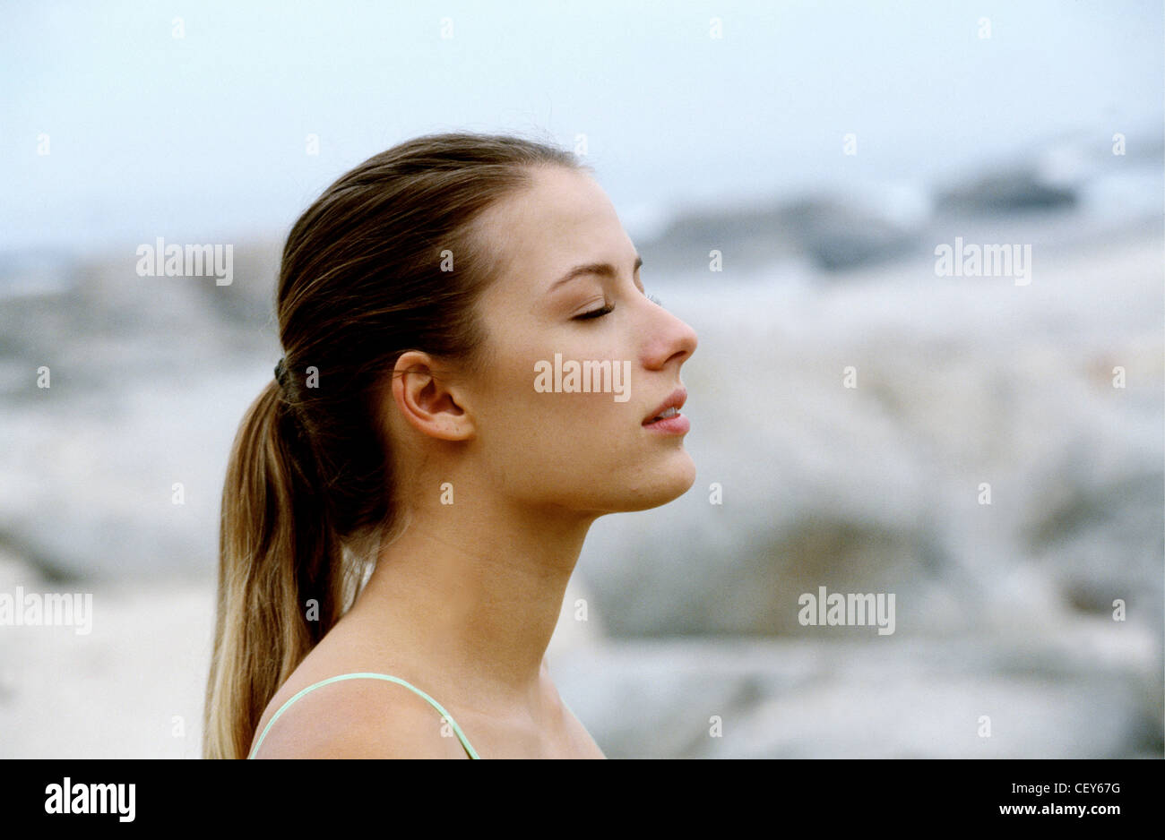 Profile brunette female facing sideways hi-res stock photography and ...