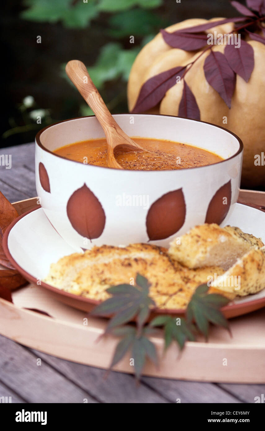 Bowl of Pumpkin Soup served bread To make: ) Slice kilos of pumpkin ...