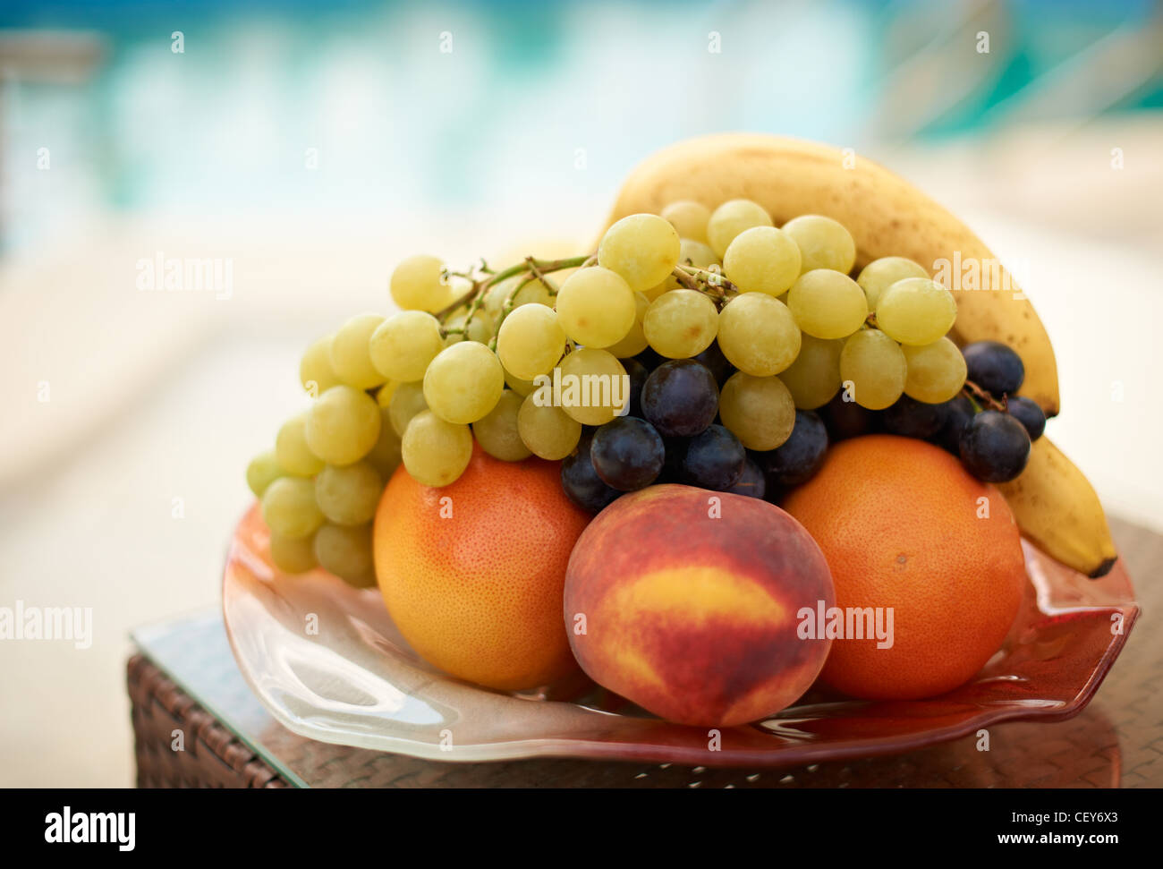 Fresh summer fruits and blue sea water Stock Photo - Alamy