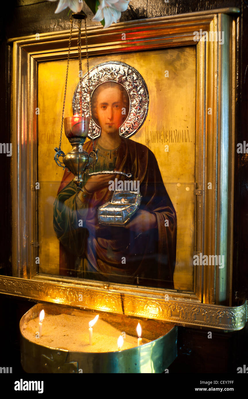 Holy apostle with picture frame in a church Stock Photo - Alamy