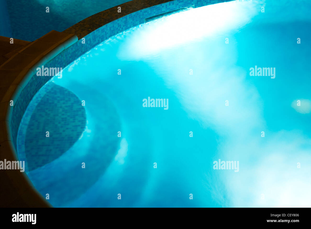 Stairs in a small swimming pool at night Stock Photo - Alamy