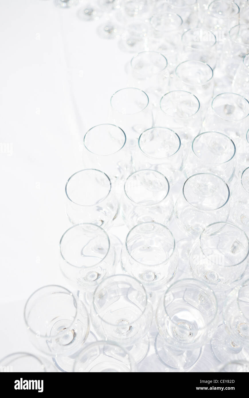 Multiple empty party glasses on table Stock Photo - Alamy