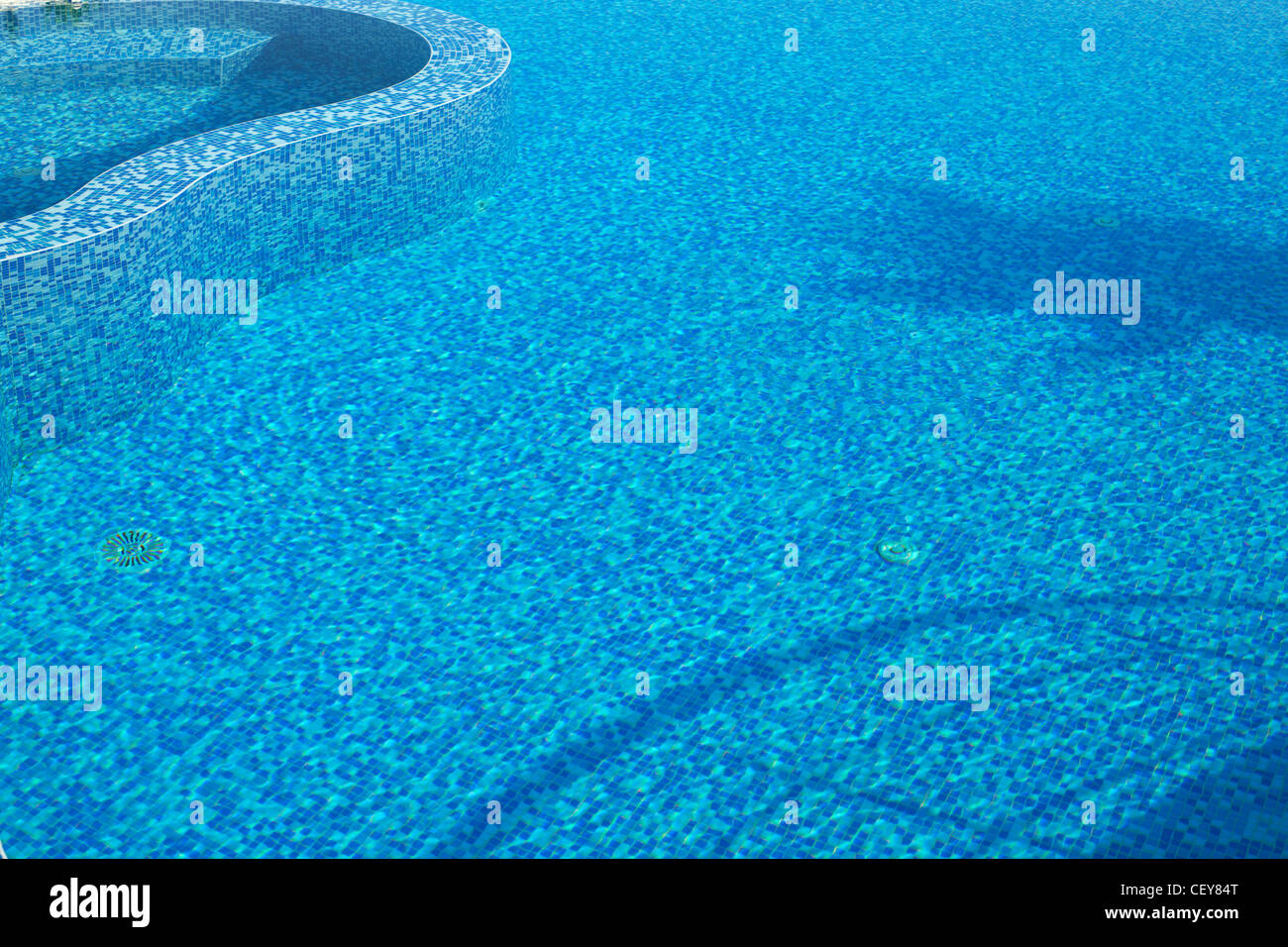 Blue water in a pool with tiles Stock Photo - Alamy
