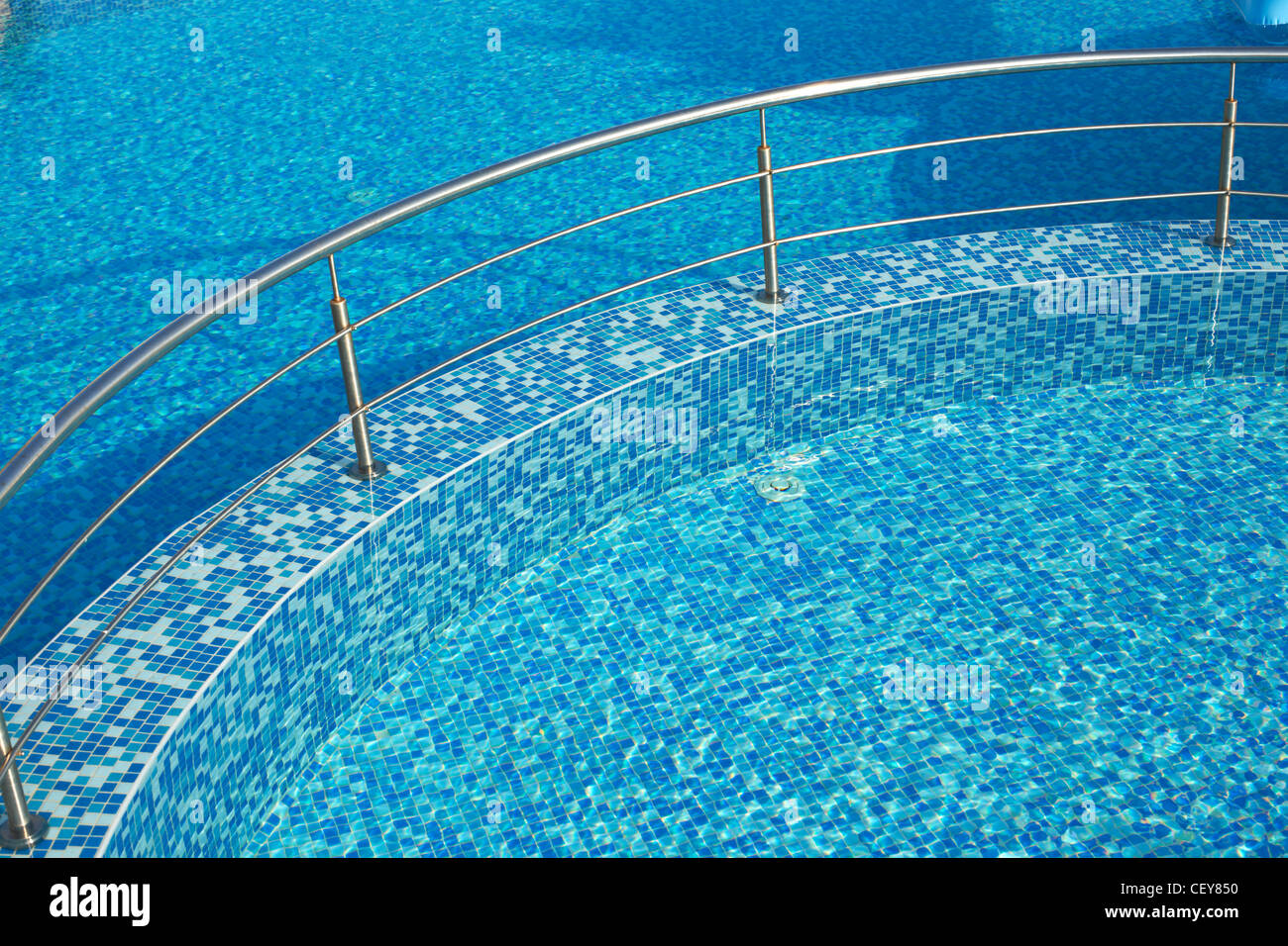 Blue water in a pool with tiles Stock Photo - Alamy