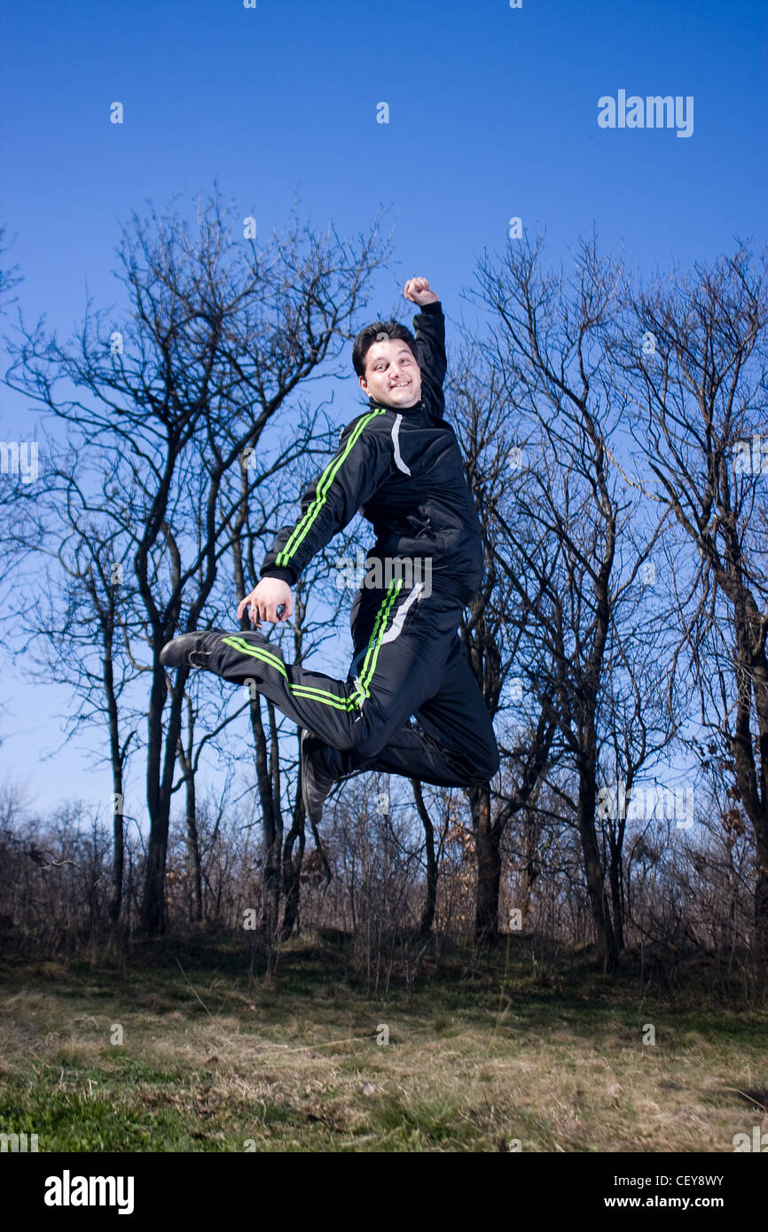 Jumping boy forest hi-res stock photography and images - Alamy