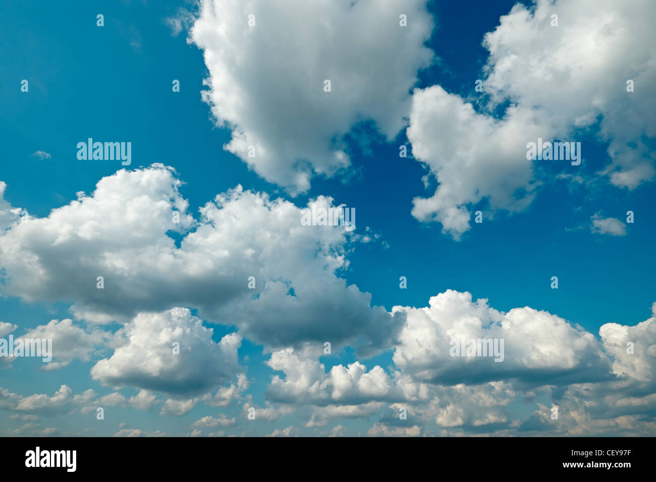 Beautiful clouds in deep blue sky Stock Photo - Alamy