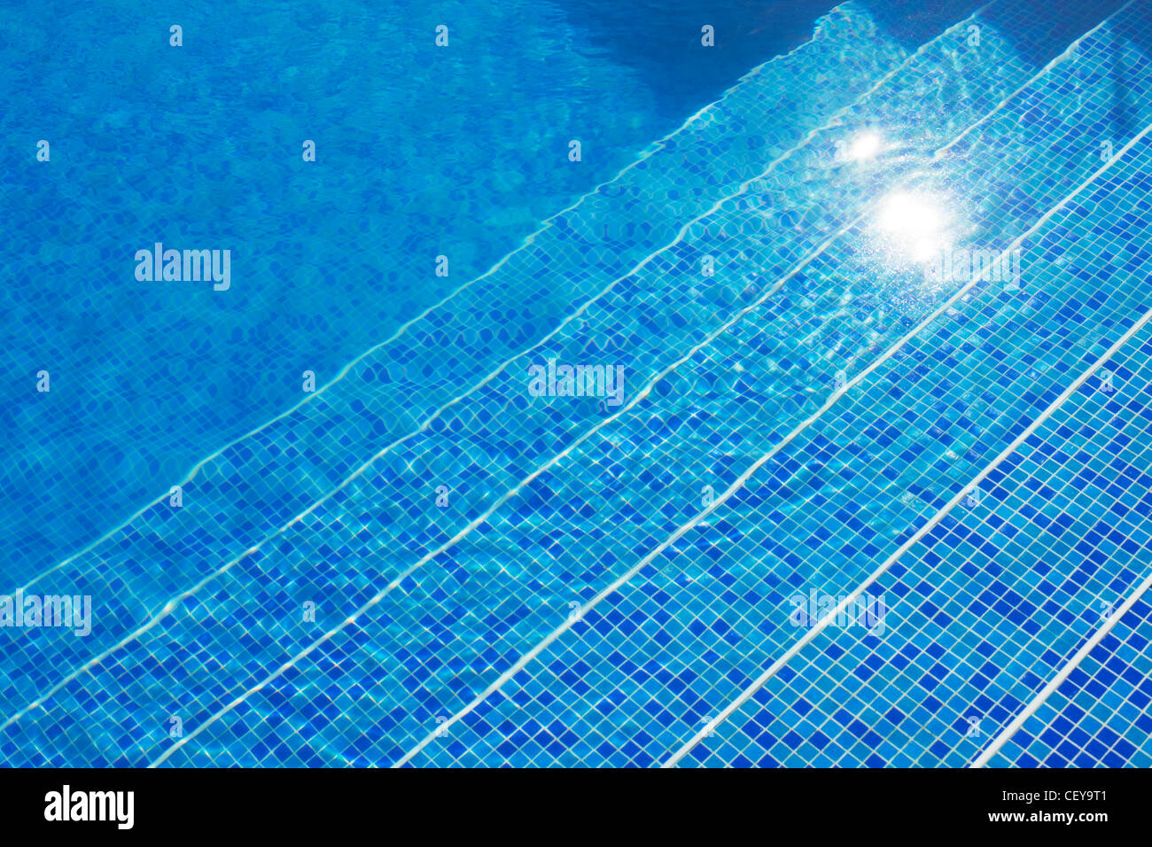 Blue tiles of a swimming pool stairs Stock Photo - Alamy