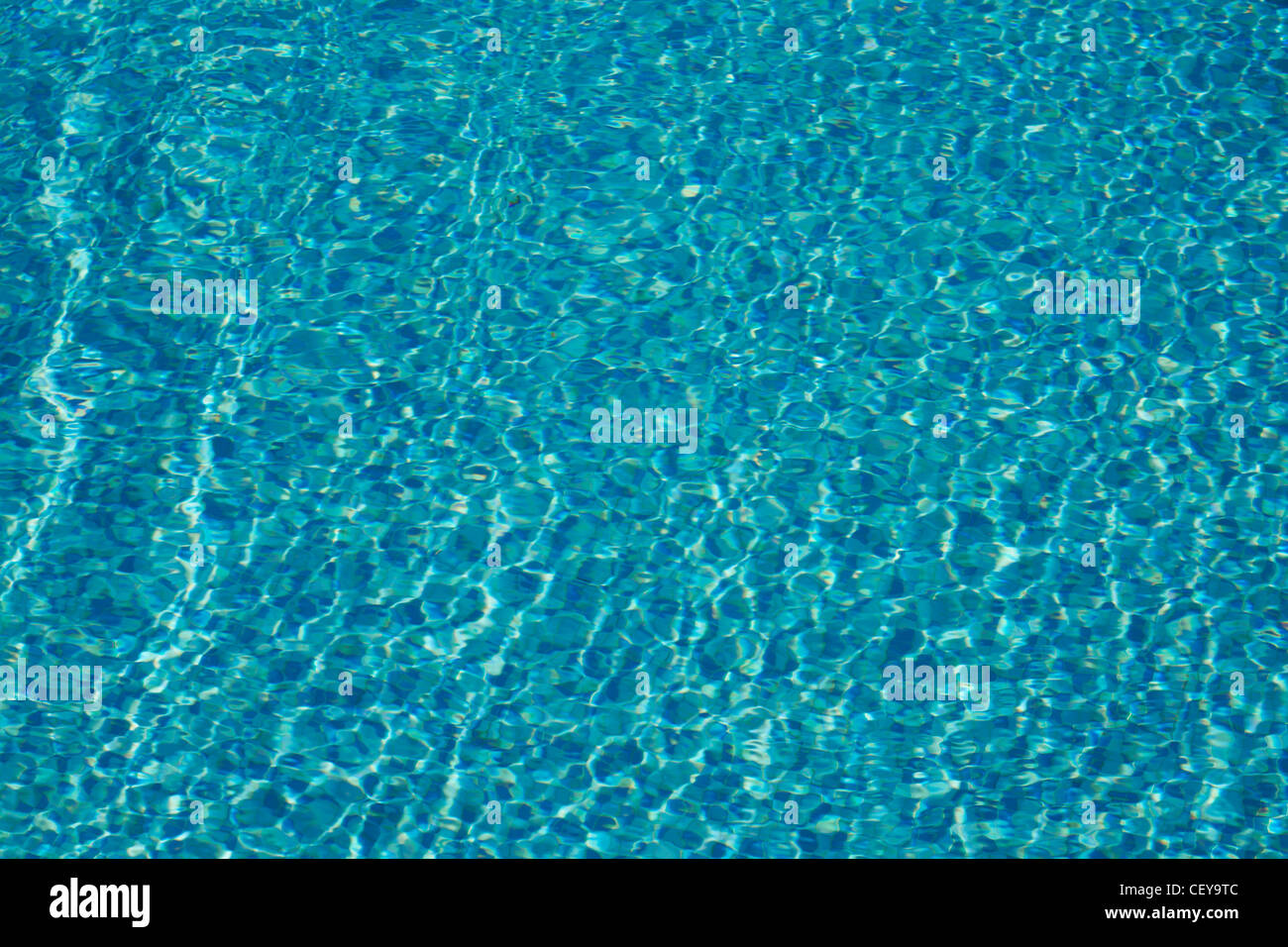 Clear blue water of a swimming pool Stock Photo - Alamy