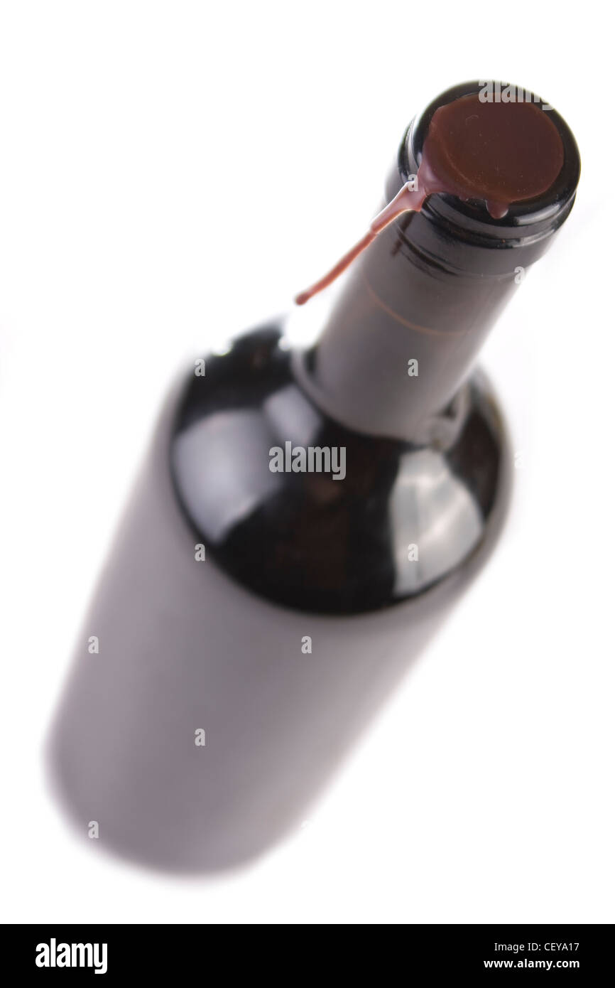 Unopened bottled of red wine isolated on white. Selective focus Stock ...