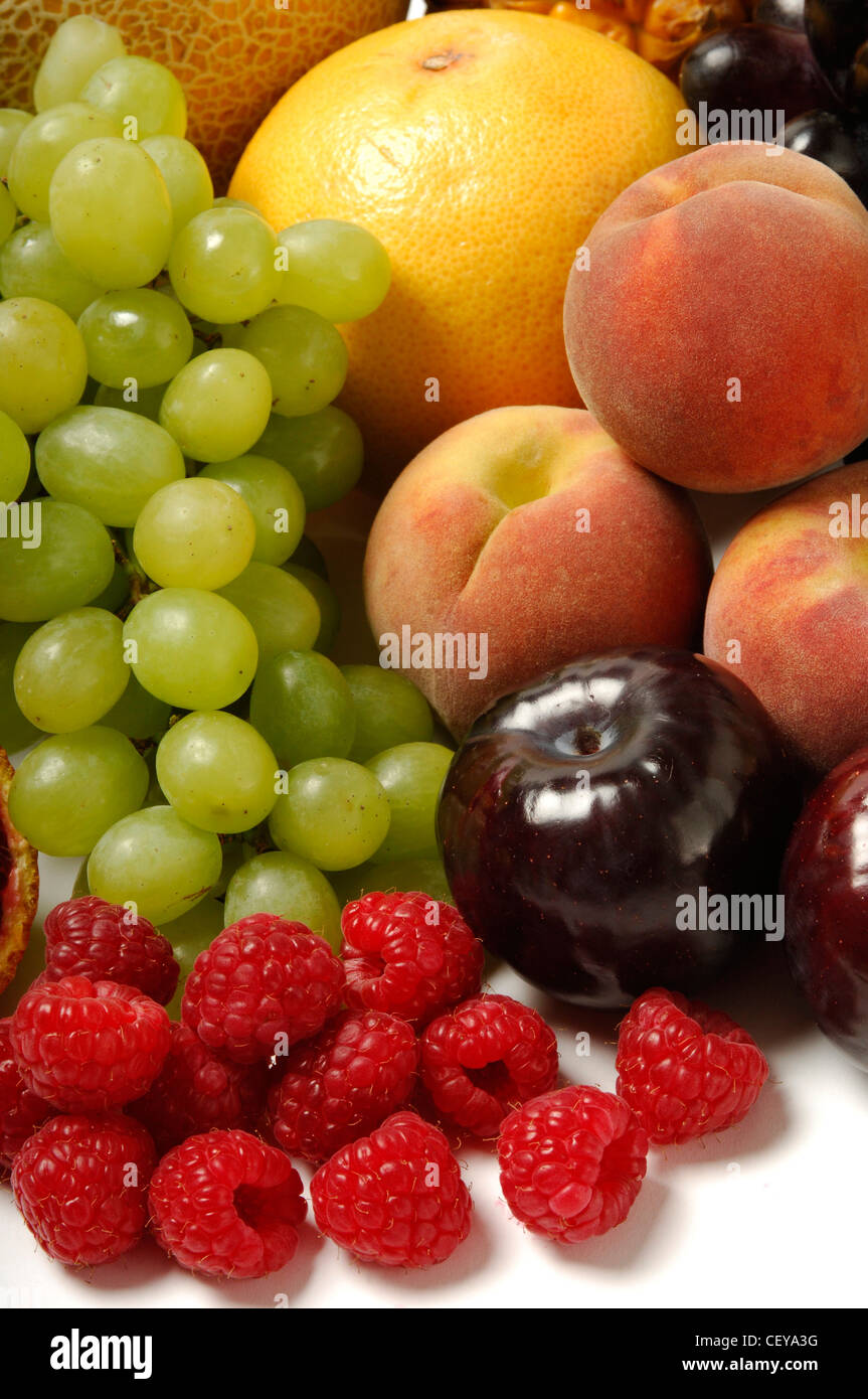 Grapes, grapefruit, peaches, raspberries, plums Stock Photo - Alamy