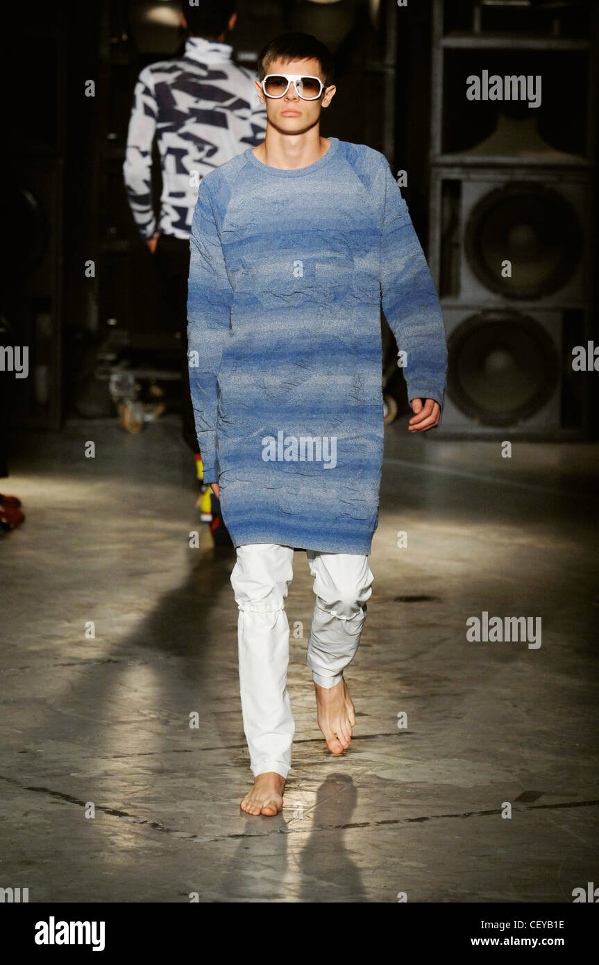 Raf Simons Paris Menswear Spring Summer Model wearing large white ...