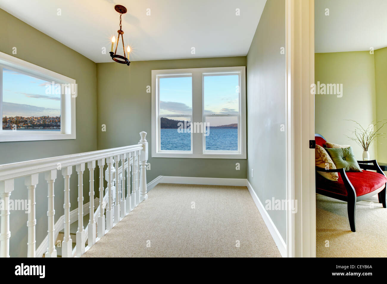 Nice home interior with stairase and hallway Stock Photo - Alamy