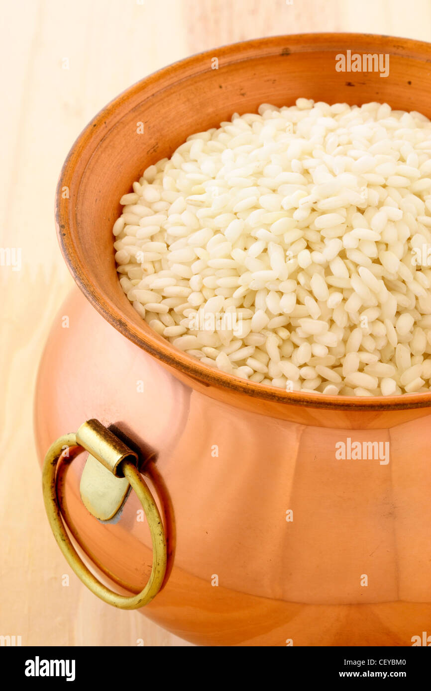 raw arborio rice used to make risotto, one of the most famous and ...