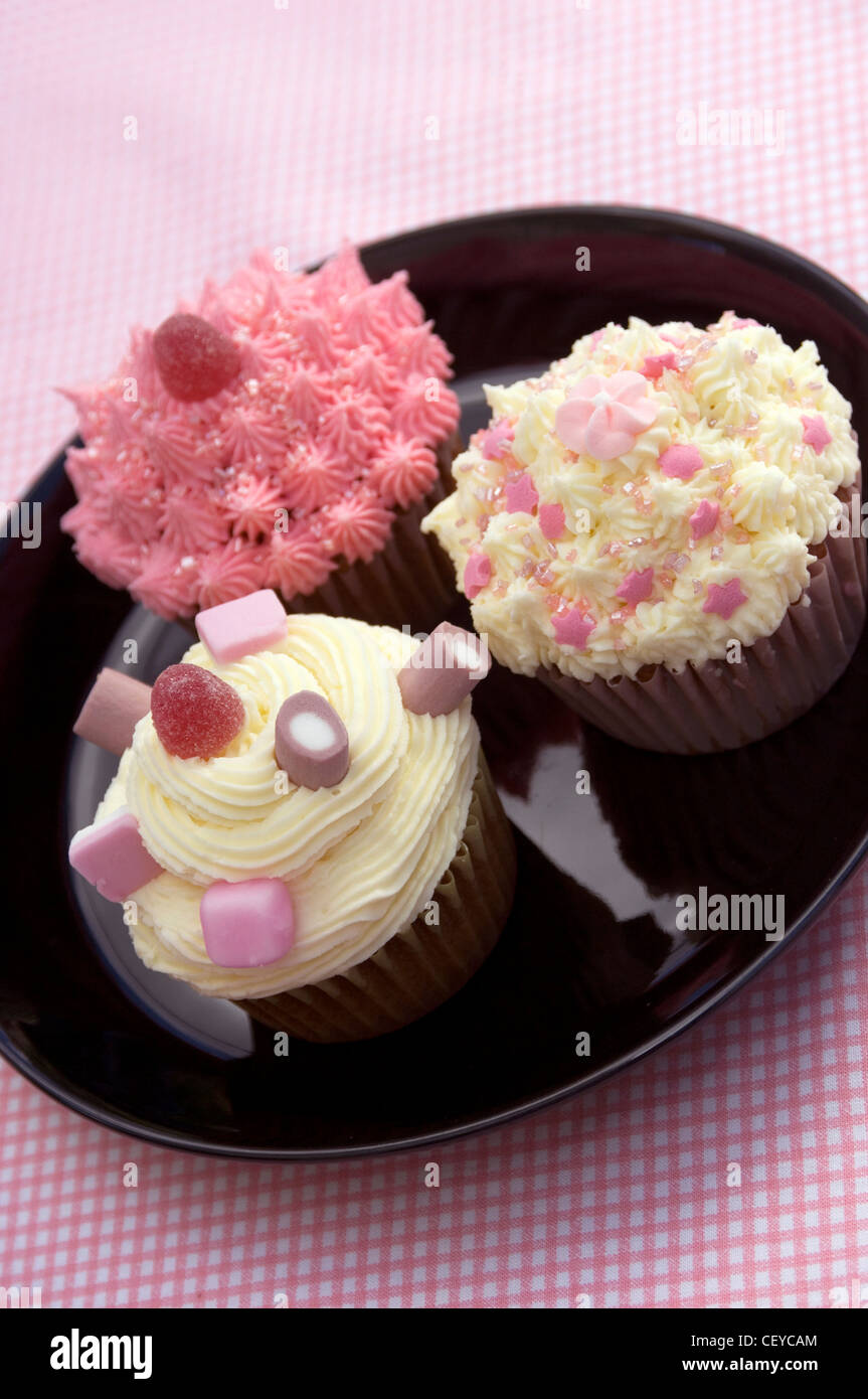 An English cream tea Cupcakes decorated with icing and sprinkles Stock ...