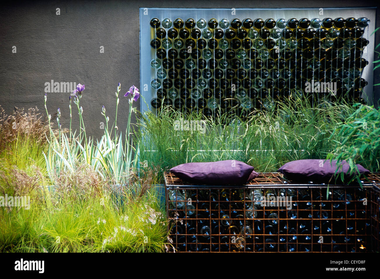 Decorative water feature and bench made from recycled glass bottles ...