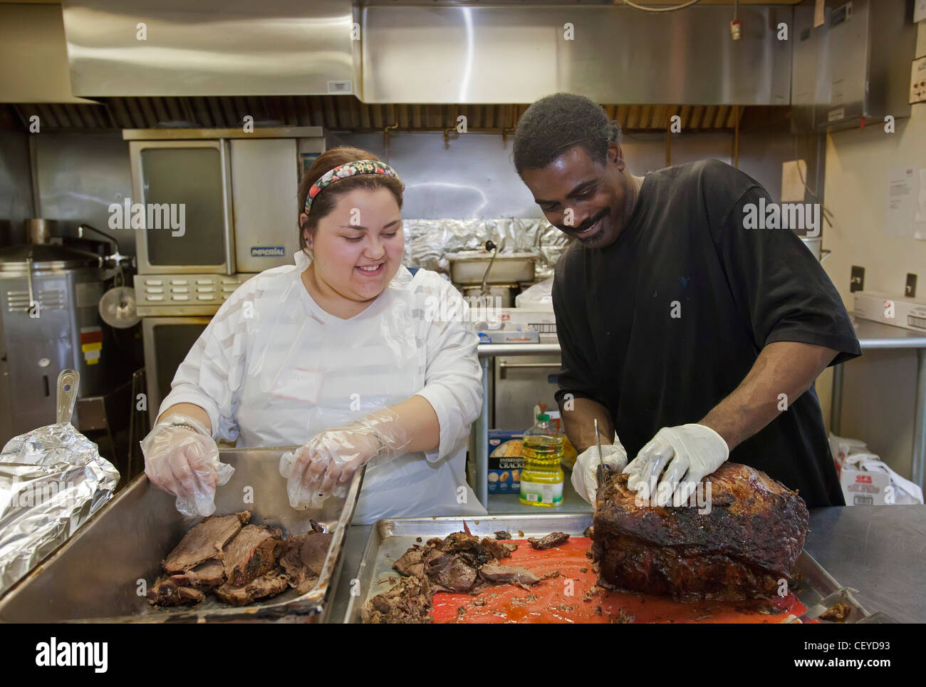 High School Volunteers Serve Dinner at Rescue Mission Shelter Stock ...