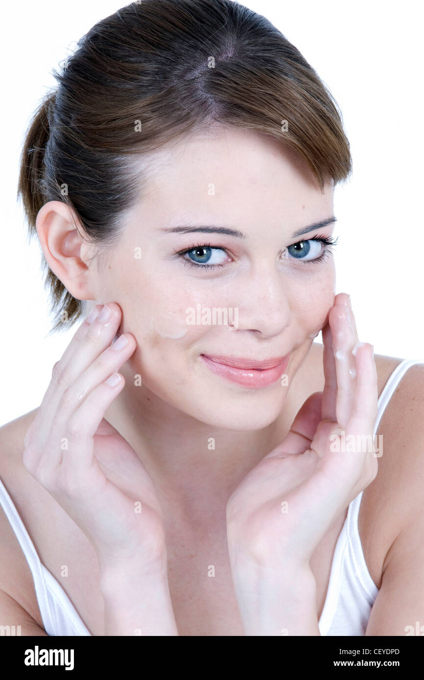 Female with her hands on either side of her face Stock Photo - Alamy