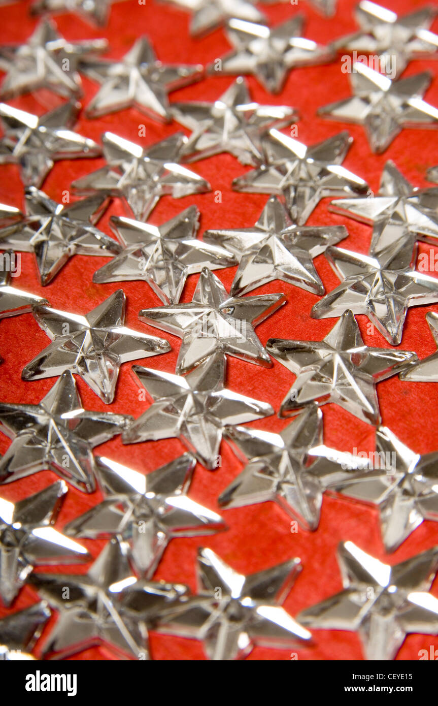 Silver stars on a red background Stock Photo - Alamy
