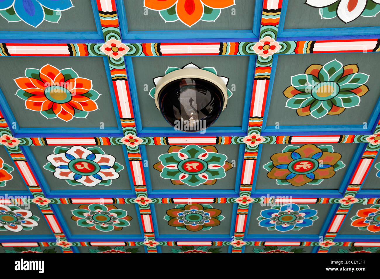 Colourful ceiling decorations with CCTV security camera dome in ...