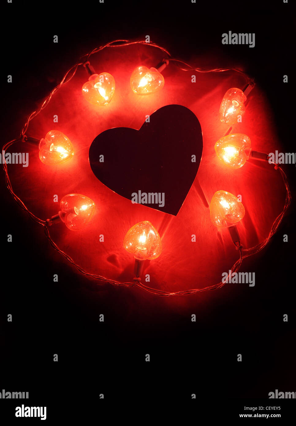 Red lights display with cut out heart shape in the middle Stock Photo ...
