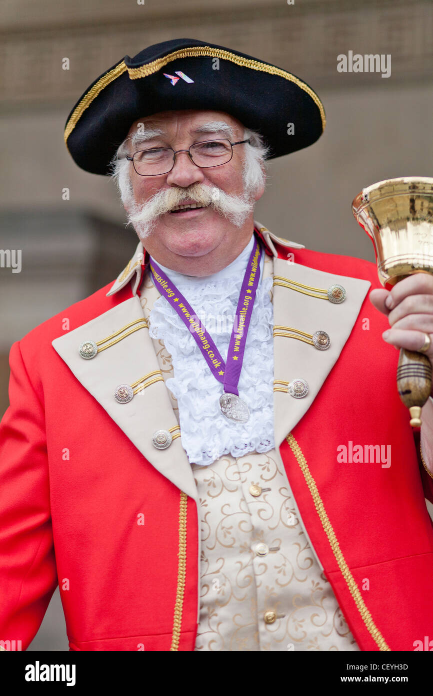 a traditional english town crier cryer in uniform Stock Photo - Alamy