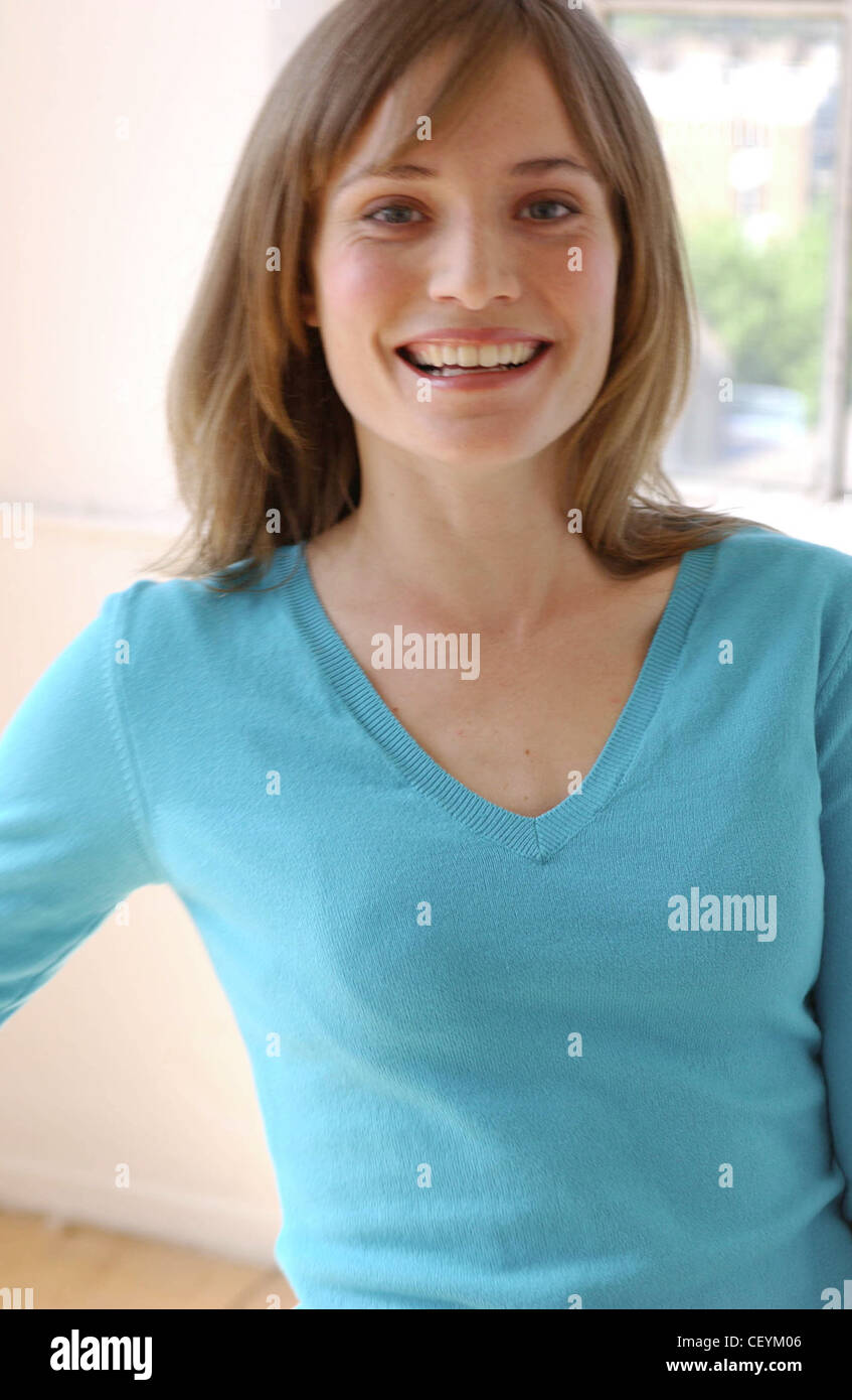 Female long light brown hair and fringe wearing subtle make up and ...