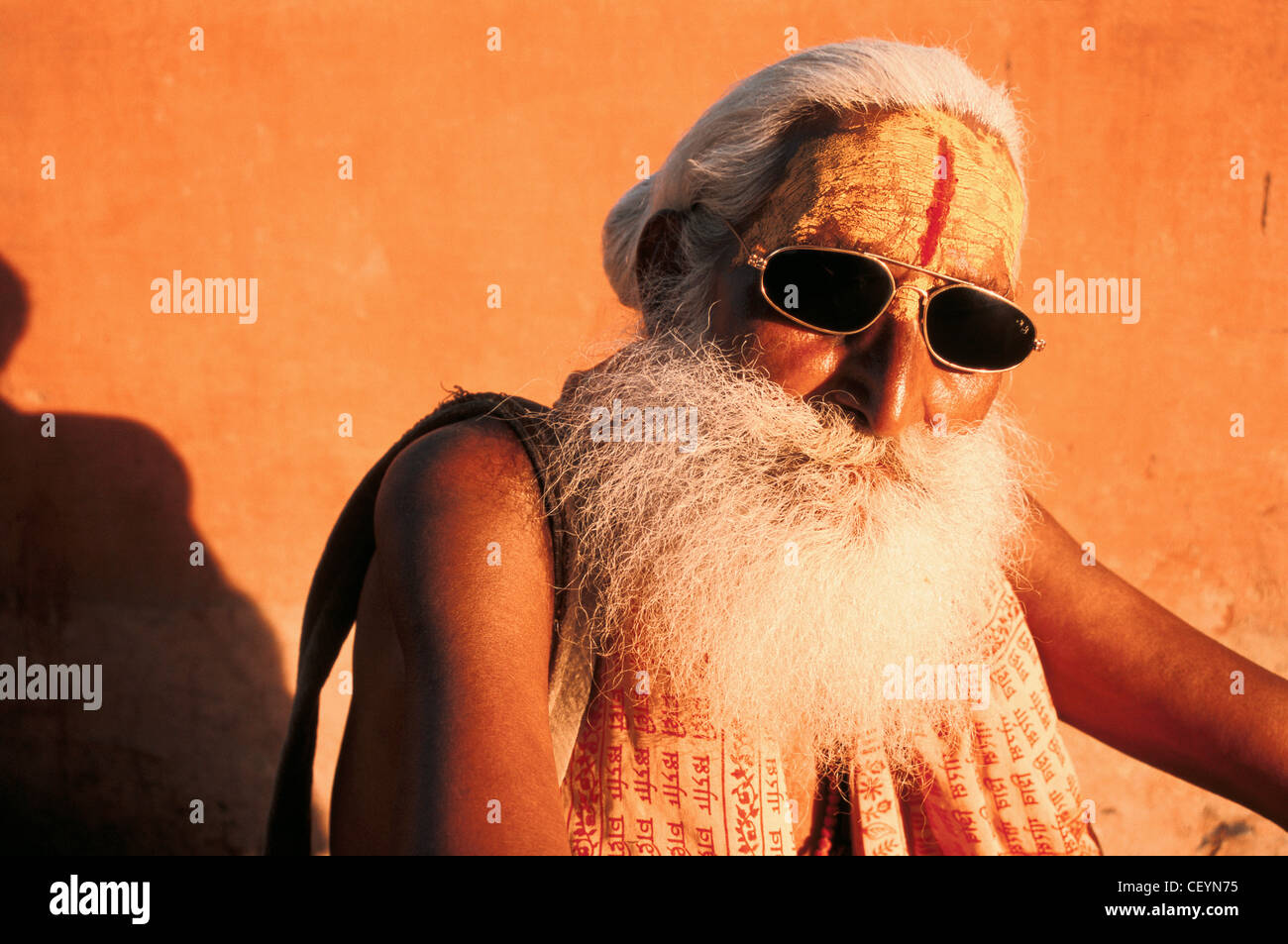 Hindu ascetic with sunglasses and large beard ( India Stock Photo - Alamy